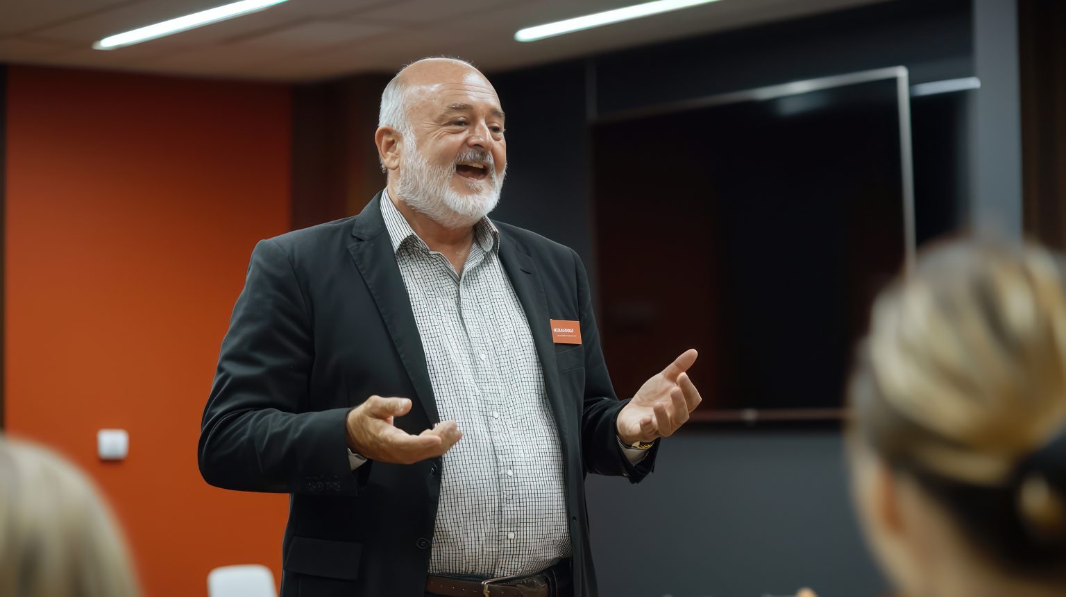 confident sales trainer delivering role-playing exercises in corporate ...